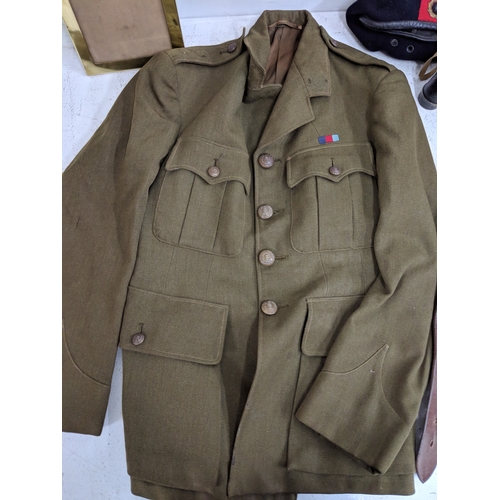 WW2 collectables to include a jacket, a beret, a belt, buttons ...