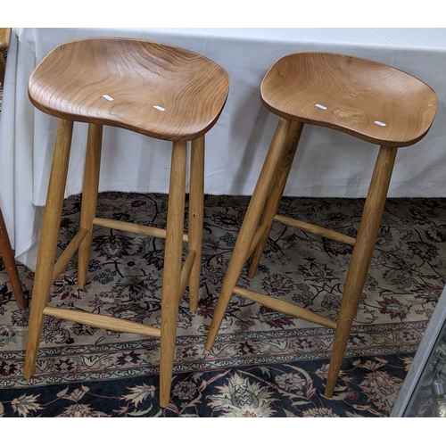 A pair of Devol ash and oak 'Bum' stools, in the Ercol design Location ...