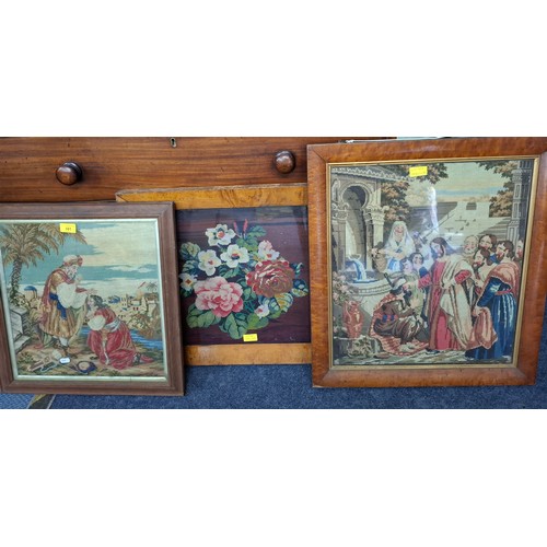 Three wool work tapestry pictures, framed, to include two Victorian ...