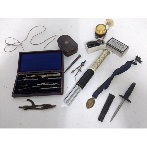 A mixed group of items to include an Ottis King calculator, serial ...