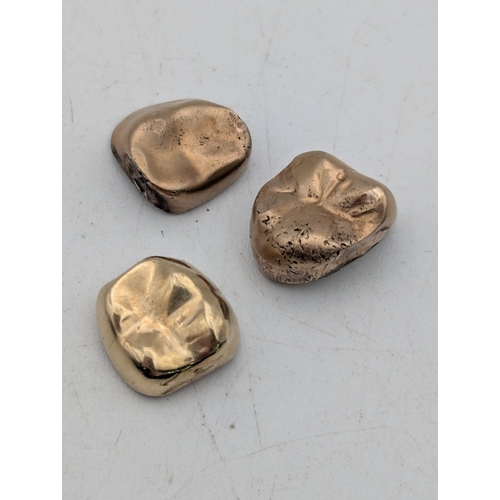 Three gold teeth tested as 14ct gold, total weight 6.4g Location:C6 If ...