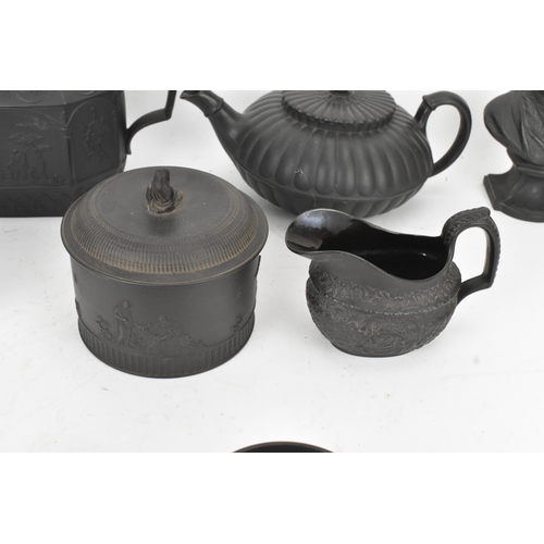 A group of 19th century black basalt stoneware teawares and decorative ...