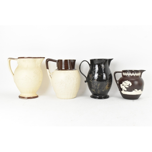 A group of 18th/19th century British jugs, comprising two cream ...