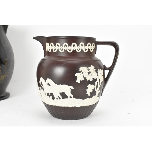 A group of 18th/19th century British jugs, comprising two cream ...
