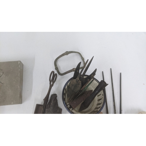 A collection of archaeological and metal detector finds to include a ...