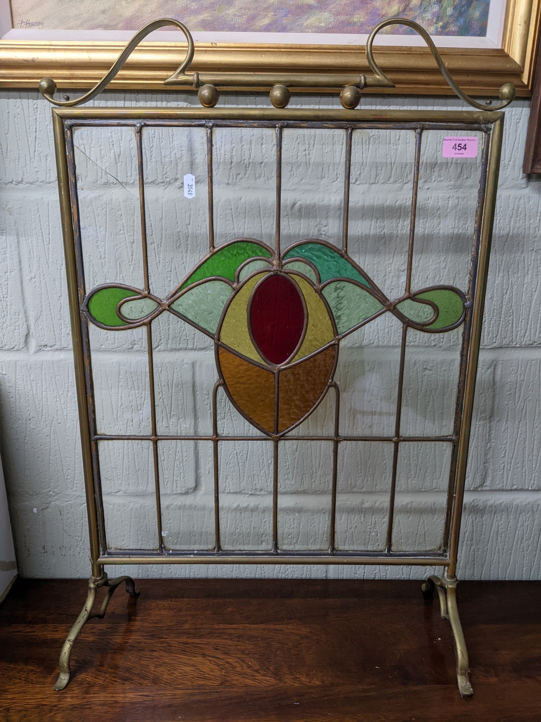 A Victorian brass framed and stained glass firescreen in Art Nouveau ...