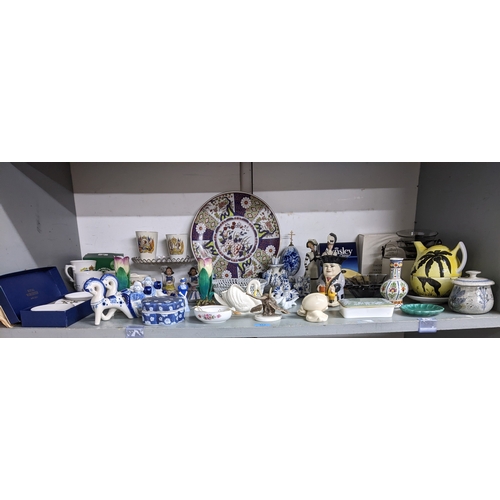 A mixed lot of mainly ceramic ornaments and glassware to include ...