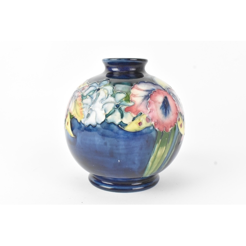 A William Moorcroft, 'Spring Flowers and Orchid' vase, tube lined ...