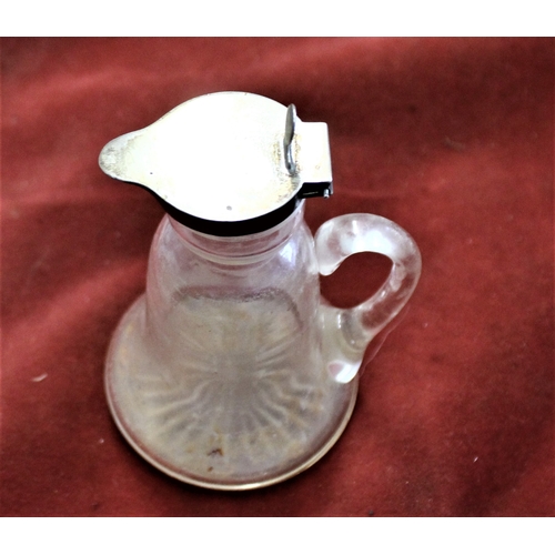 Silver topped glass oil bottle, made H&H Birmingham and dated 1913