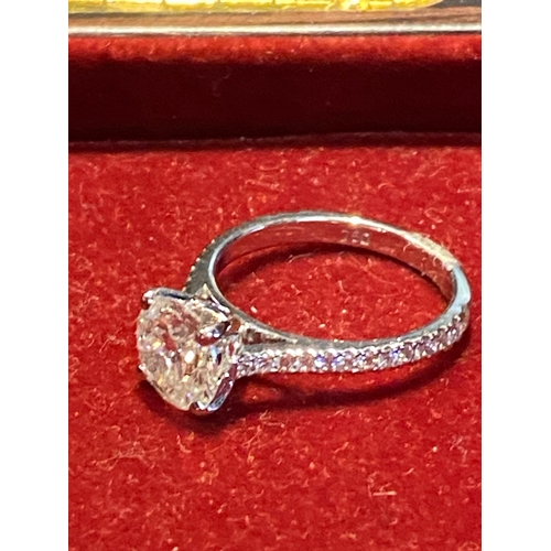 18 ct White Gold Diamond Solitaire Ring with diamond shoulders. Centre ...