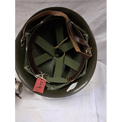 Plastic Military Helmet with padded Interior and a Water Flask