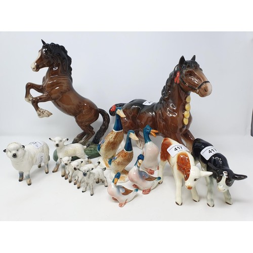 A family of five graduated Beswick ducks, a Beswick sheep, leg glued ...