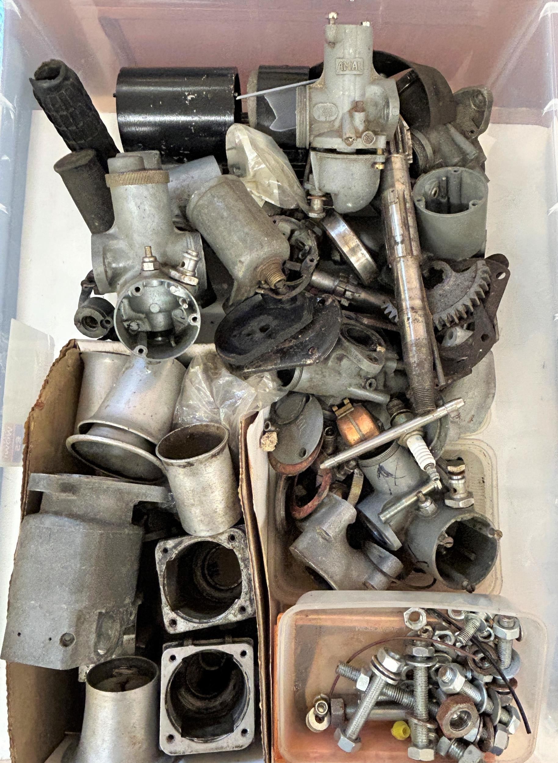 Assorted Triumph motorcycle parts, to include various carburettor and ...