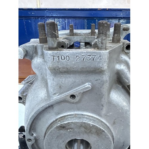 A Triumph T100 motorcycle engine casing, stamped T100 27374