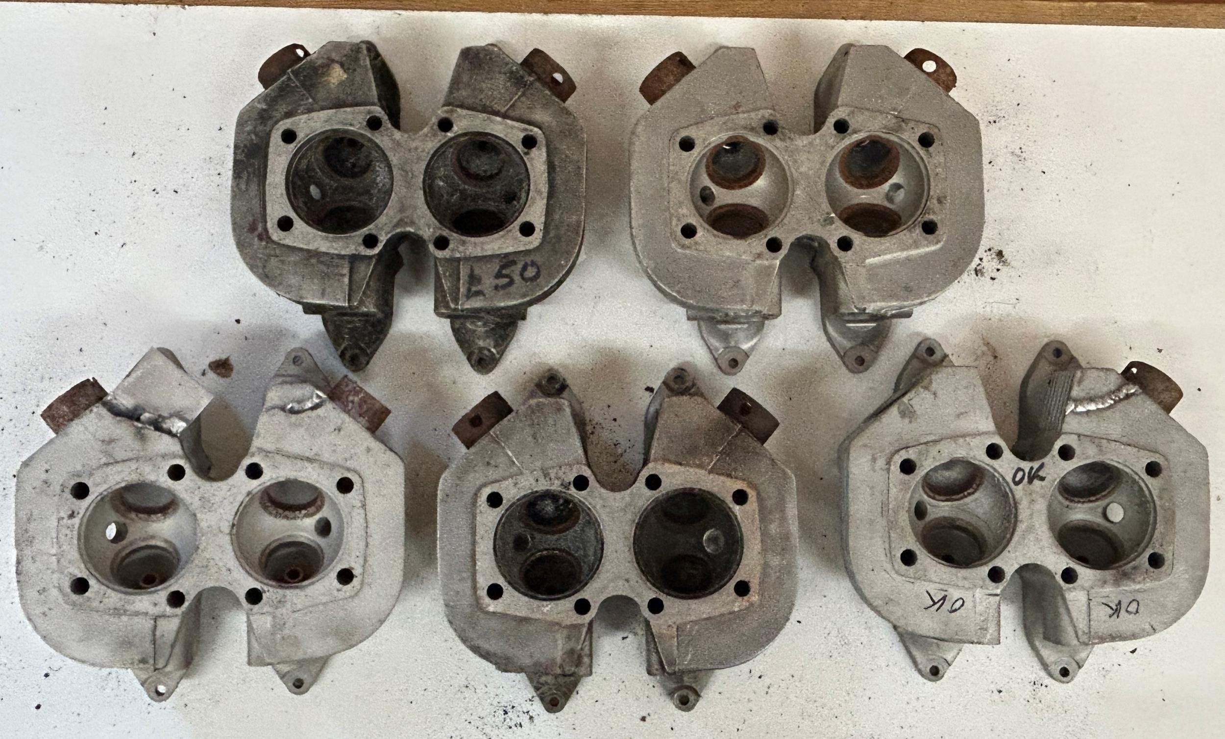 Assorted Triumph motorcycle cylinder heads (5)