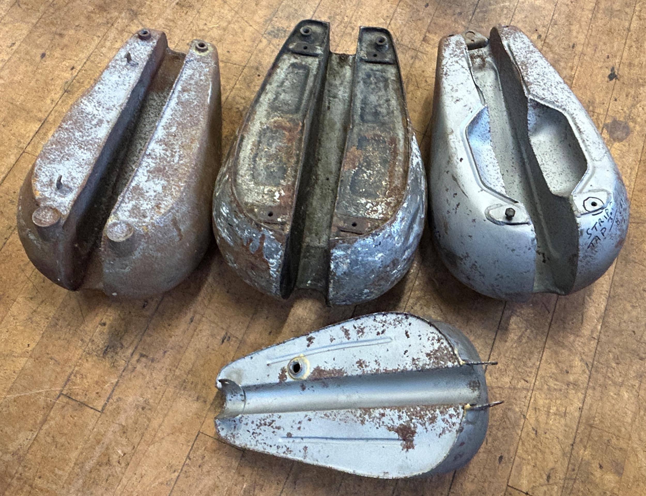 Four classic motorcycle fuel tanks (4)