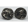 Two Armand Bargas silver buttons