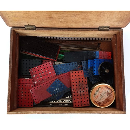 Assorted vintage Meccano, in a wooden box