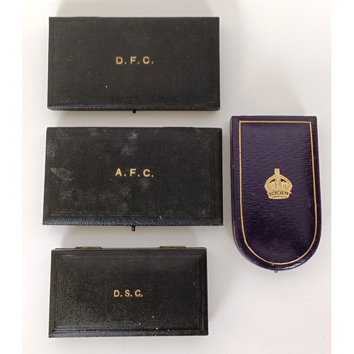 Four medal boxes, for a DFC, AFC, MC and DSC and a group of modern copy ...