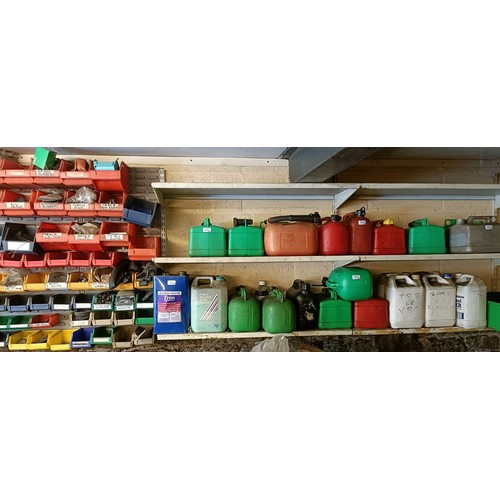 Assorted fuel cans, on the shelves, and a group of accessories in the ...