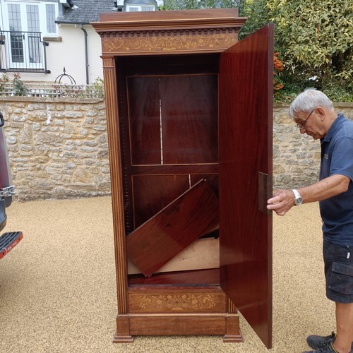 A 19th century Continental cupboard, of architectural form, marquetry ...