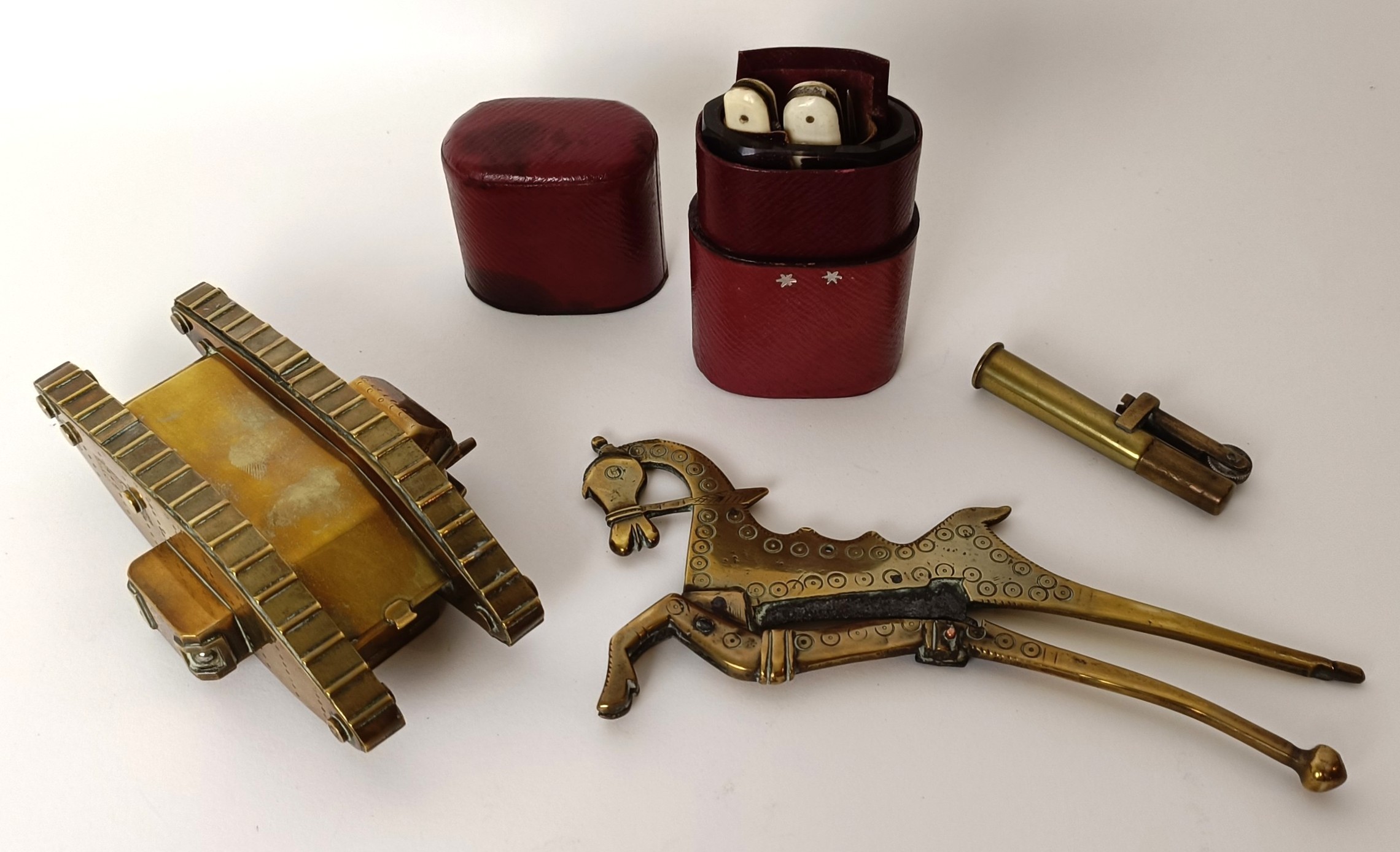 A trench art brass tank, and other items