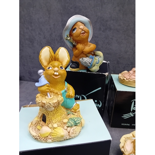 A collection of Pendelfin hand-painted Stone Craft rabbit figurines ...