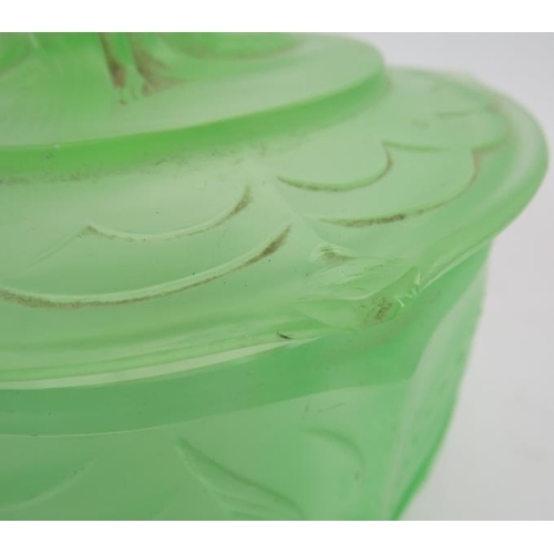 An Art Deco green uranium glass six piece 'Mermaid' dressing table set ...