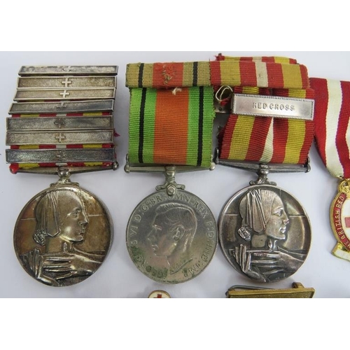 A large collection of Red Cross and Voluntary Medical Service medals ...