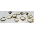 A collection of eleven rings, three of which are 9ct gold to include a ...