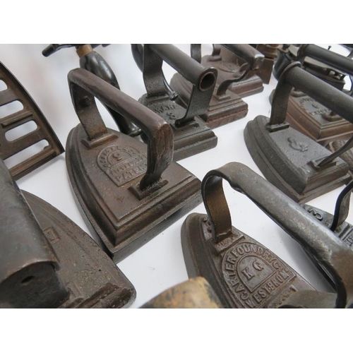 A large collection of Victorian irons and trivets. (24 items) longest ...