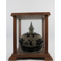 A Prussian WWI period metal mounted leather pickle helmet. Also ...