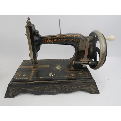 An early 20th Century Muller child's sewing machine, a Brunonia Atlas ...