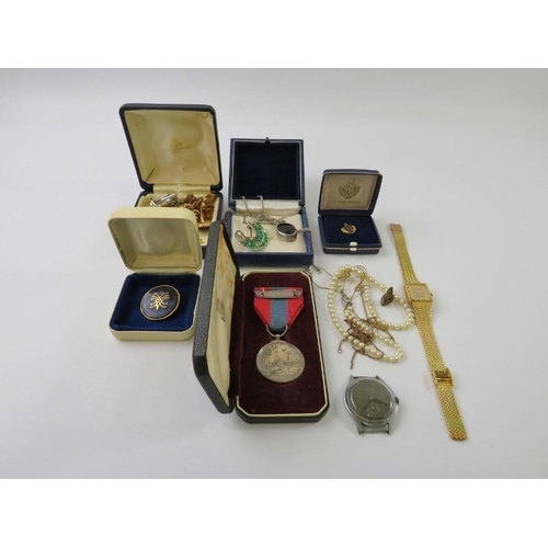 A mixed lot to include an Imperial Service Medal; various chains ...