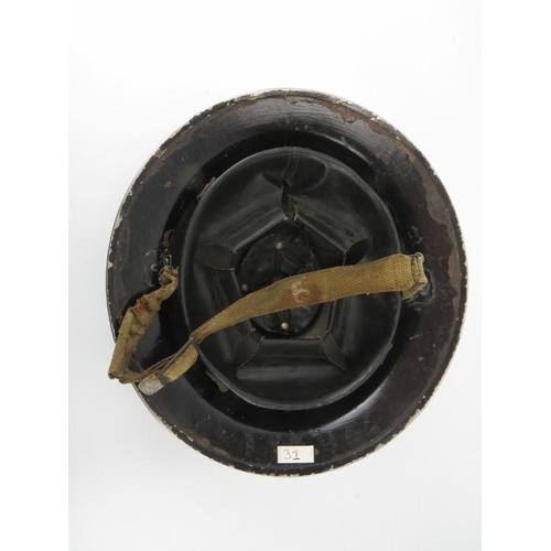 A WWII British RAF Brodie helmet. Painted Royal Air Force Roundel to ...