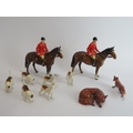 Two Beswick Hunstmen on bay horses with matching fox and six hounds ...
