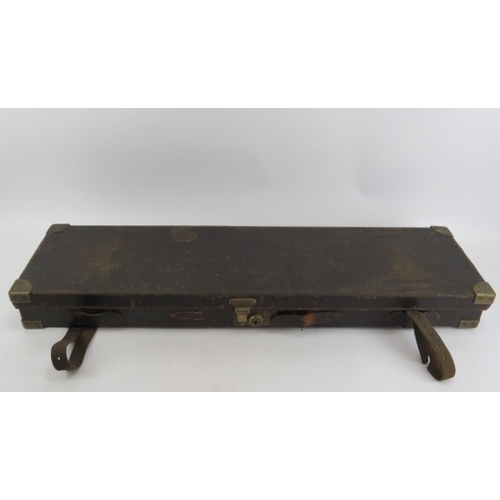 An antique James Purdey & Sons gun / rifle leather case with various ...