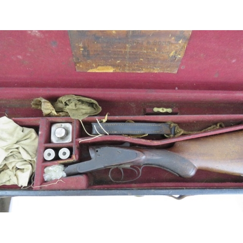 An antique James Purdey & Sons gun / rifle leather case with various ...