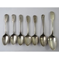 Six Georgian silver fiddle back spoons and a later beaded pattern ...