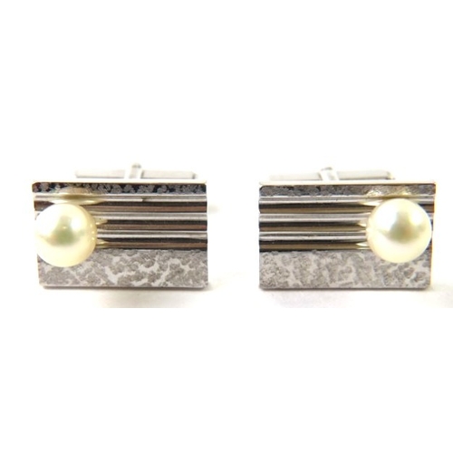 A pair of yellow metal cufflinks, stamped with Egyptian marks for 18ct ...