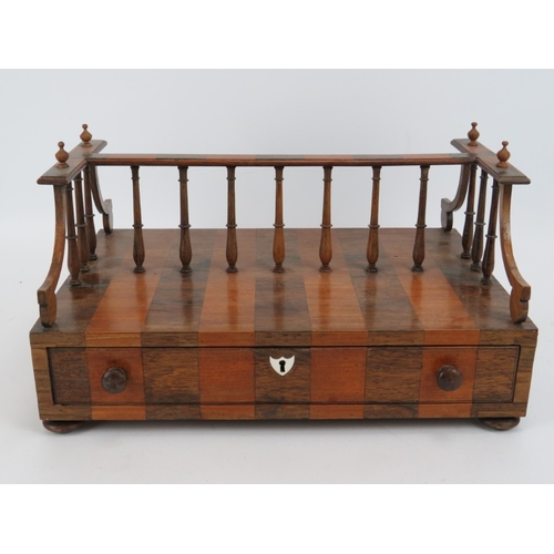 A Regency style banded rosewood tabletop double sided books stand, 19th ...