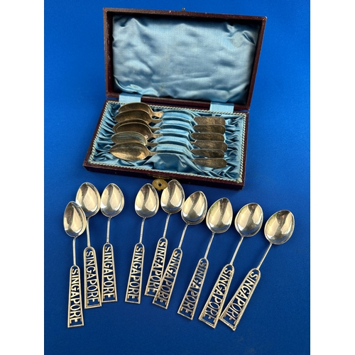 Two Sets of White Metal Teaspoons