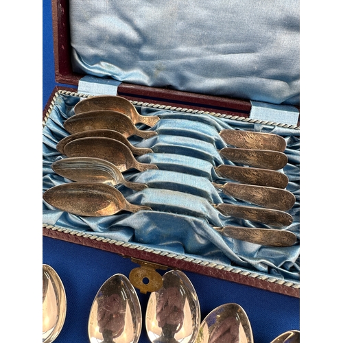 Two Sets of White Metal Teaspoons