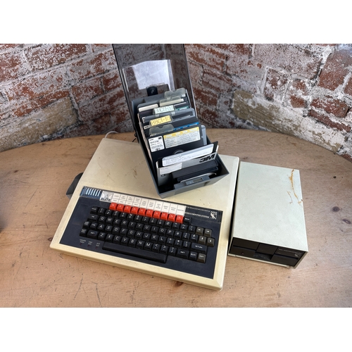 BBC Microsystem with Floppy Disk Drive and Collection of Floppy Disks