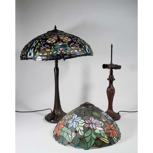 Two modern bronzed resin Tiffany-style table lamps, each with floral ...