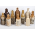10 19TH-CENTURY EARTHENWARE BEER BOTTLES