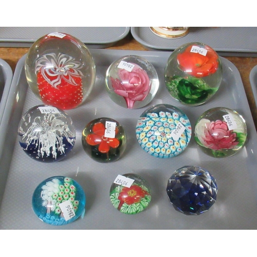 Tray of glass paperweights of various designs, some floral, some cane ...
