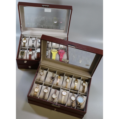 Two watch boxes comprising assorted ladies and gents modern ...