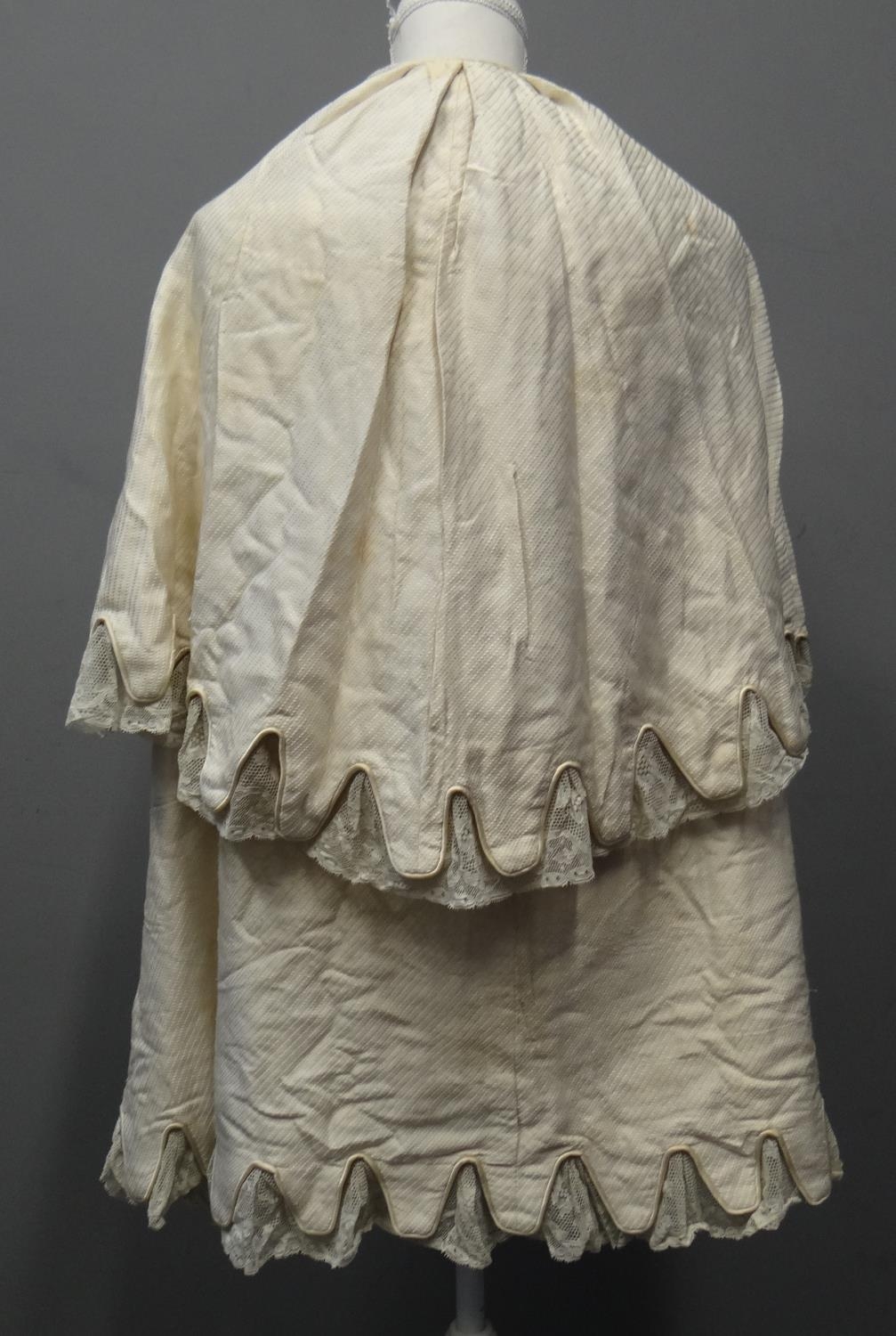 Late 19th/early 20th Century brocade cloak with lace trim and ribbon ...