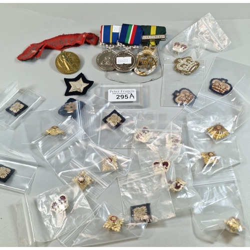 A collection of British military fabric badges, insignia pips together ...